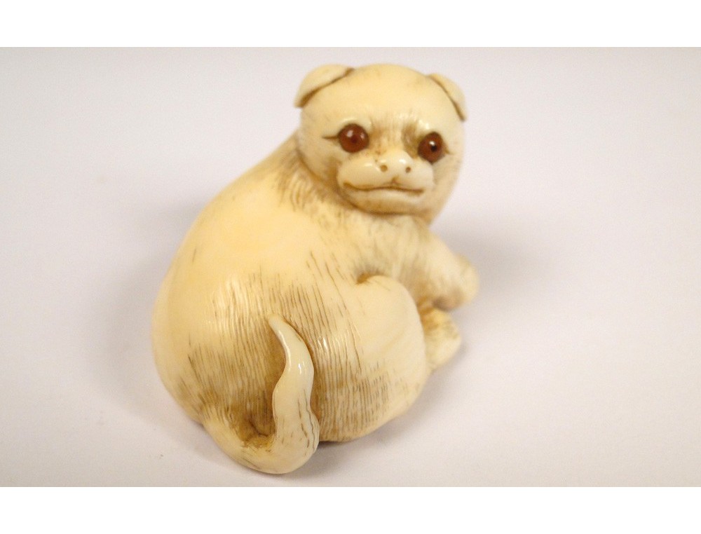 Carved ivory netsuke, small dog, sculpted by Masanao Suzuki, Shinsuke ...